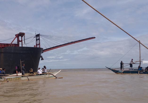 Chinese vessel in river dredging held offshore