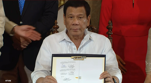 Duterte signs law on national ID system