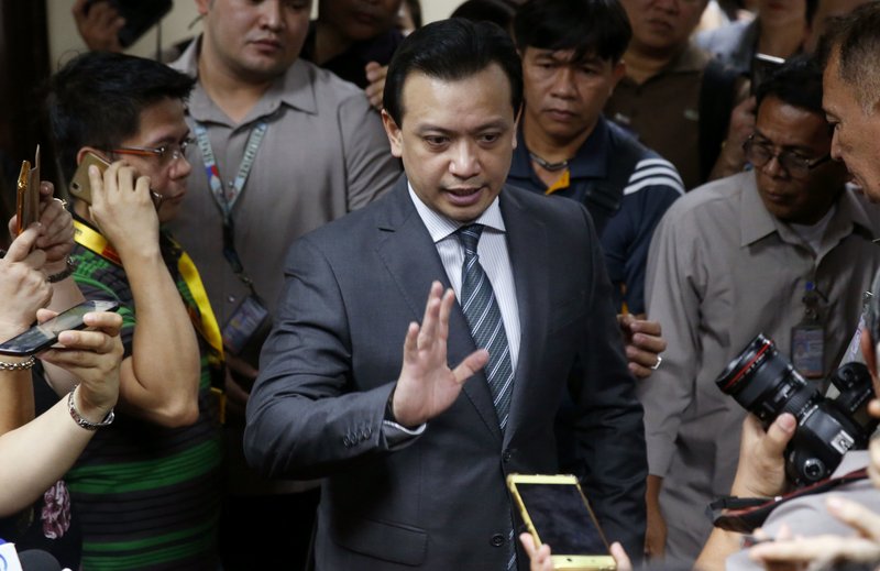 Trillanes arrested for rebellion charge, then posts bail