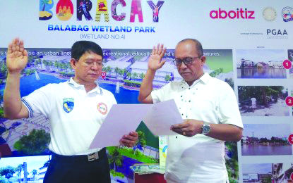 Sualog takes oath as acting Malay mayor