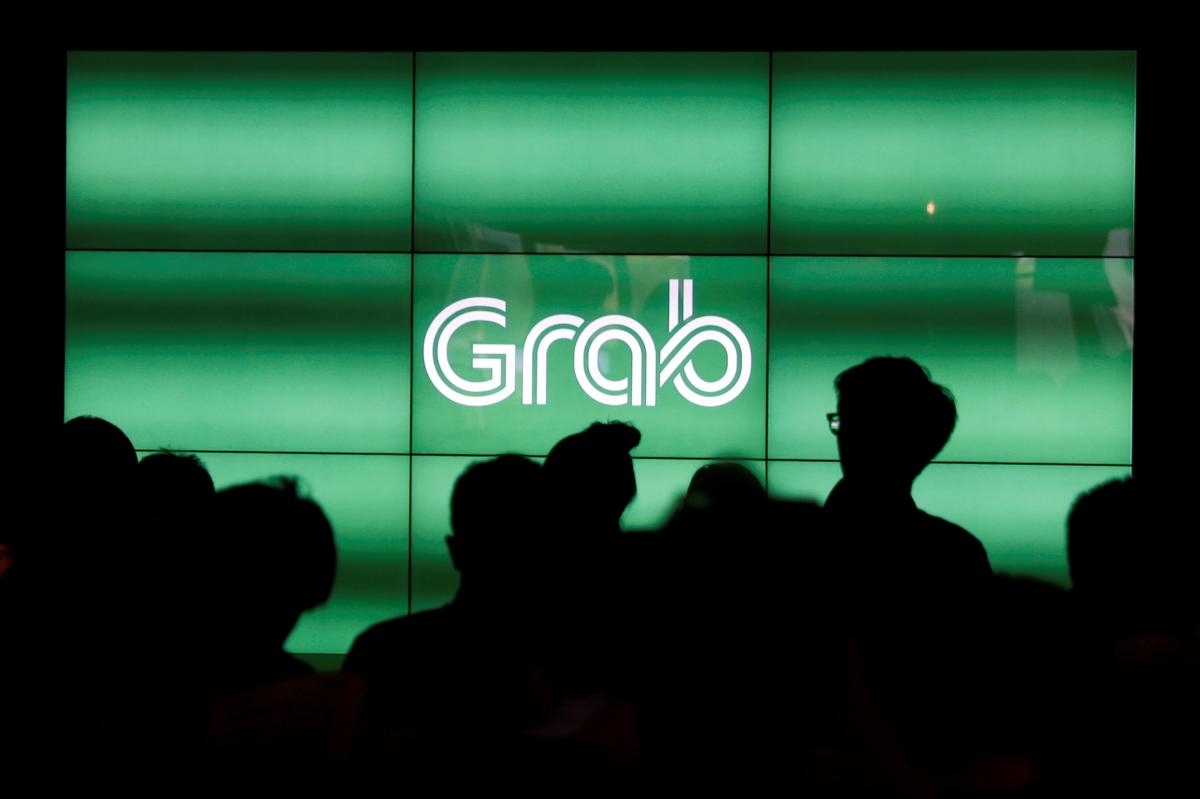 Philippines fines Grab, Uber for rushed merger, drop in service quality