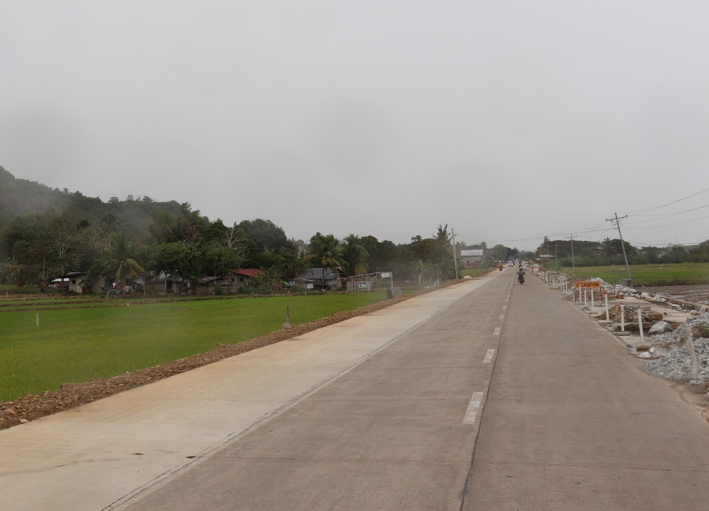 Road widening in northern Iloilo town nears completion