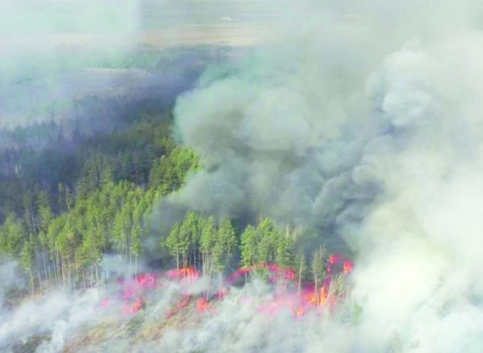 Fire raging near Ukraine's Chernobyl poses radiation risk