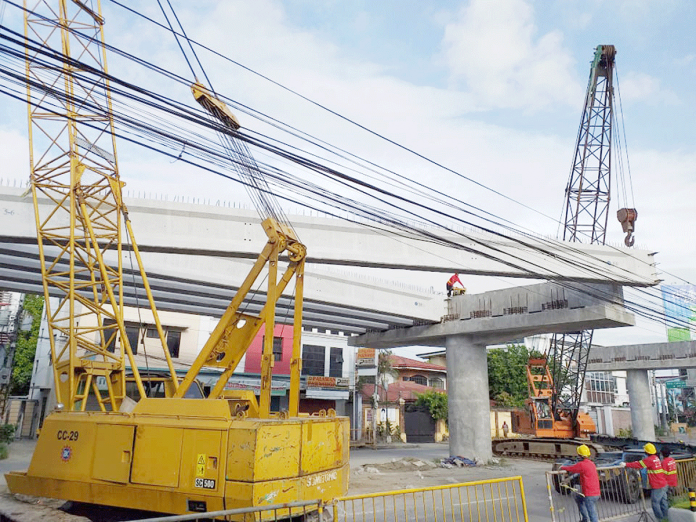 DPWH vows on time completion of Ungka flyover girder installation