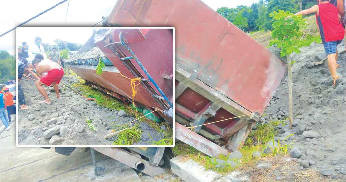 Sand collapses on lad