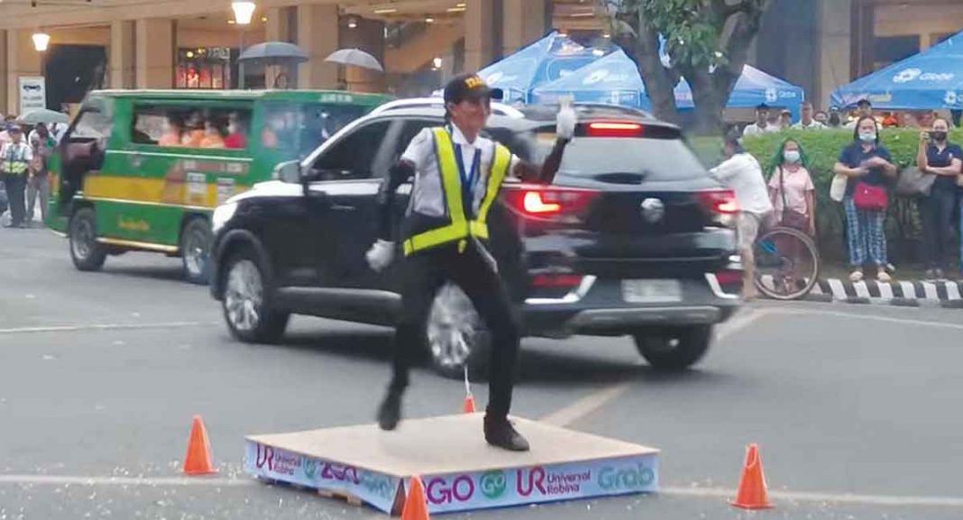 Female traffic aide rules Dancing Traffic Enforcer Challenge