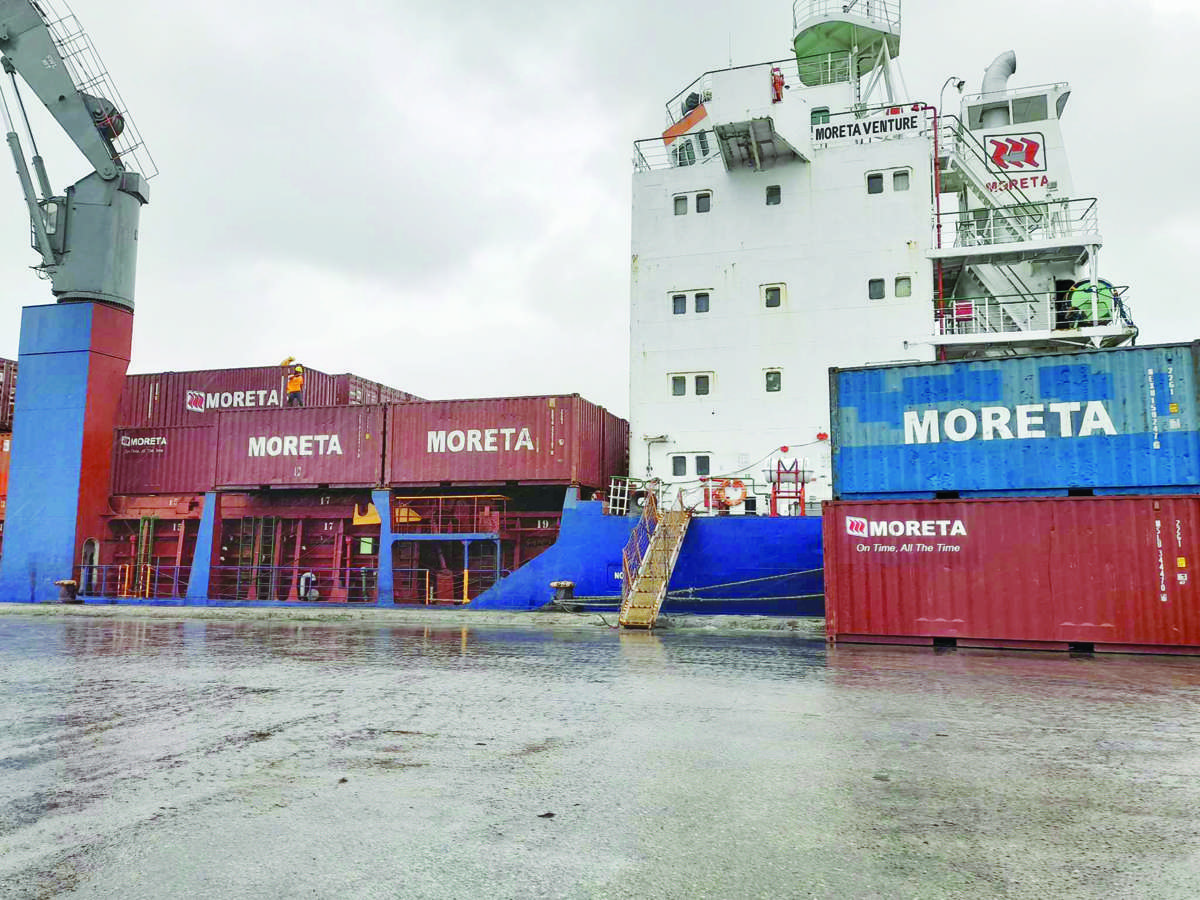 Container van falls off ship