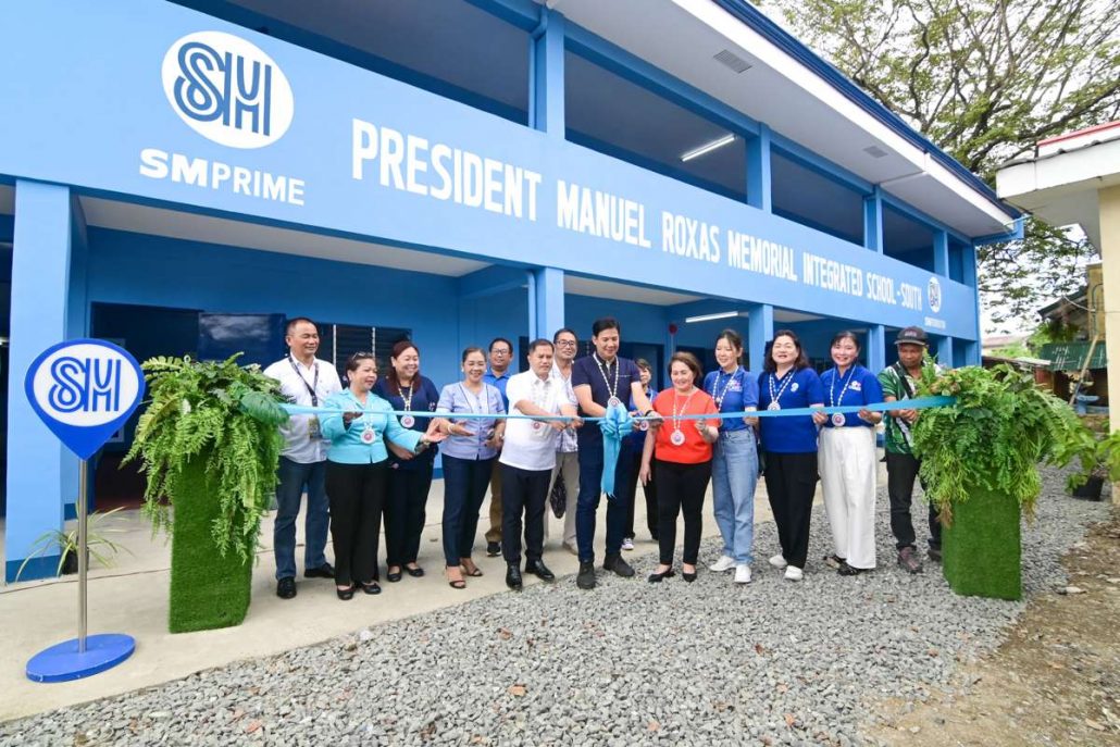 SM group turns over 104th school building