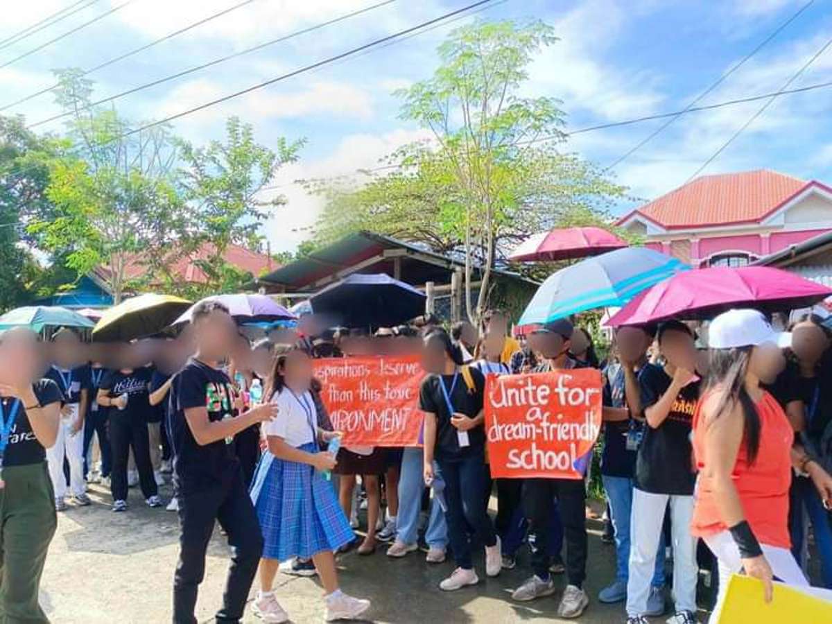 Antique school principal urged to step down