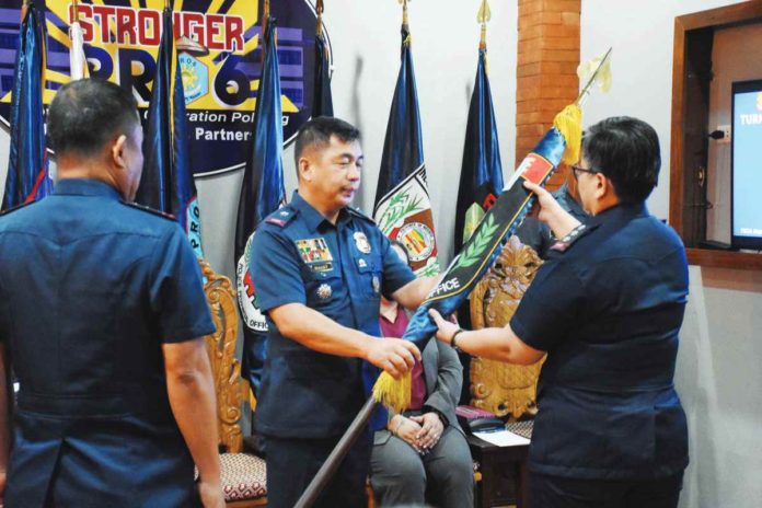 Antique top cop assumes post