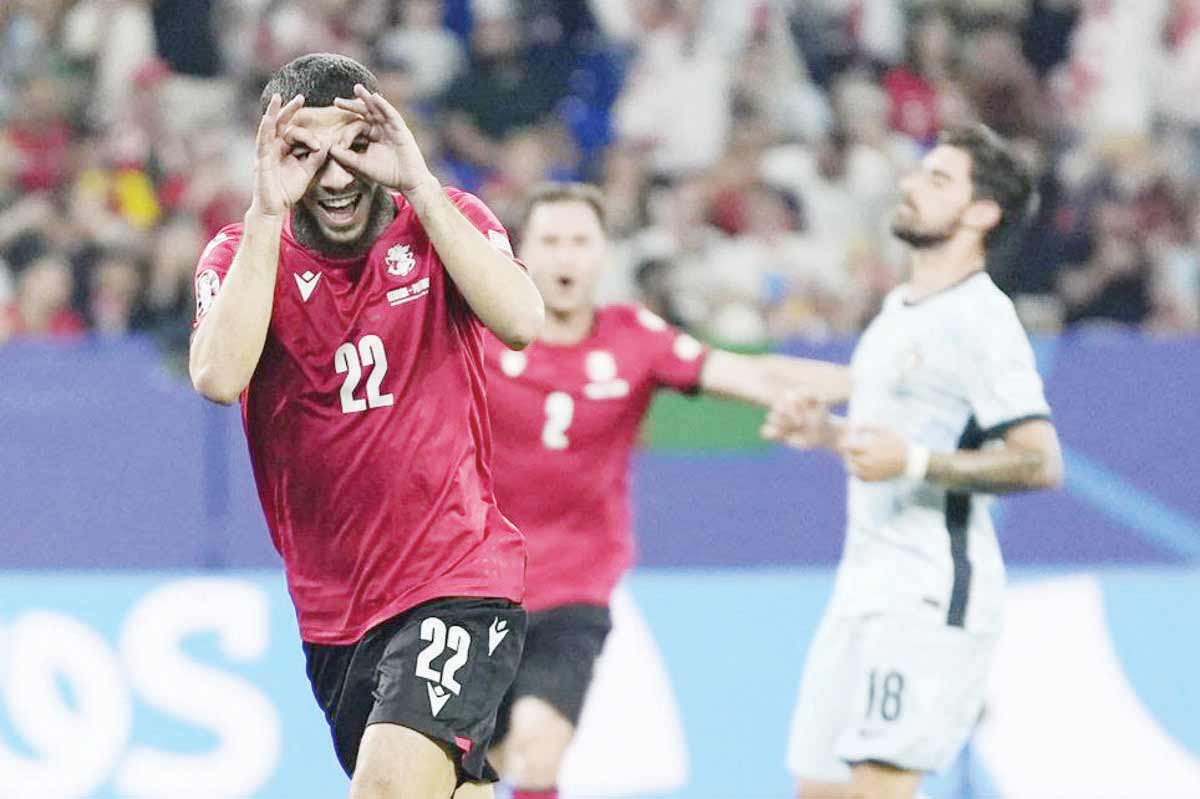 Georgia upsets Portugal, enters Euro KO round