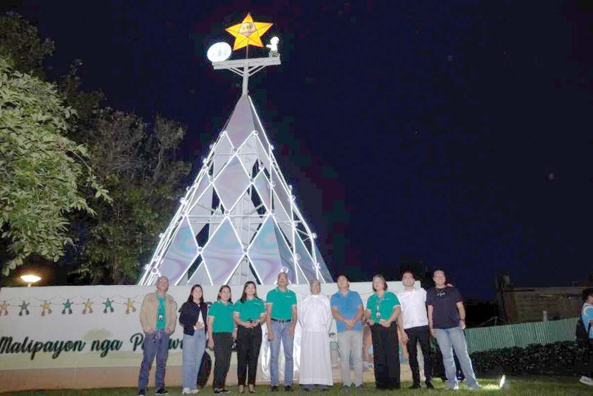 MORE Power lights up Iloilo with the iconic Twin Christmas Trees