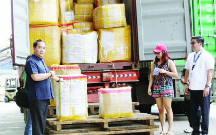 BOC starts delivery of abandoned ‘balikbayan’ boxes to kin of OFWs