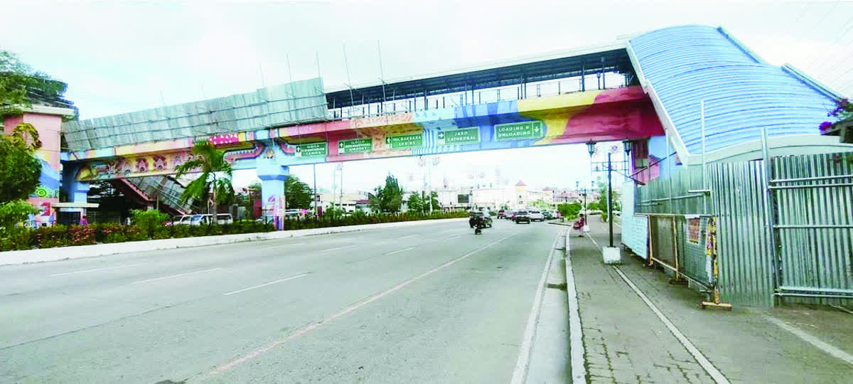 DIVERSION ROAD OVERPASS: Material revisions trim budget without ...