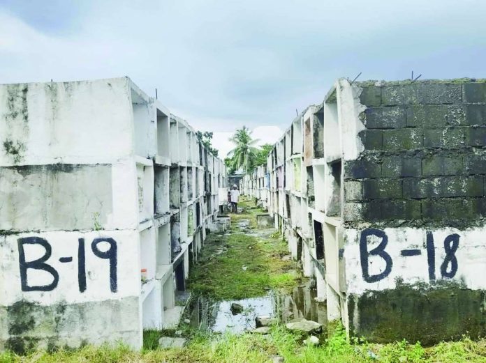 Overcrowded cemetery prompts Bacolod to transfer remains to bone vaults